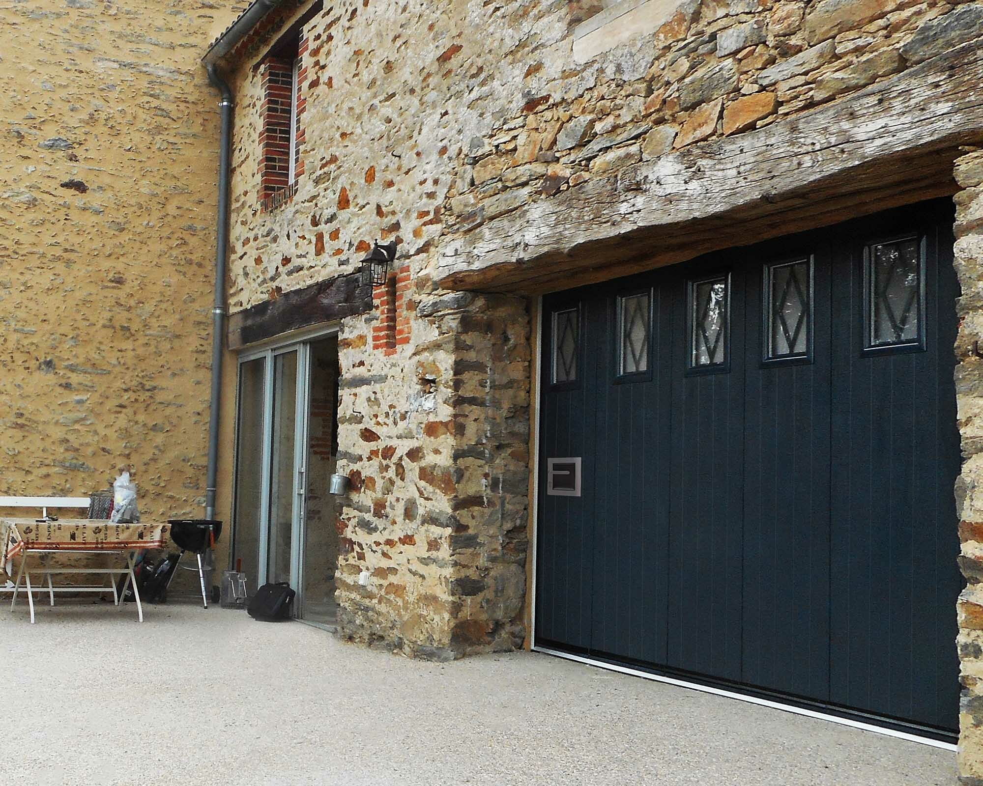 Photos de Portes de Garage Habitat | Espace professionnel | La Toulousaine